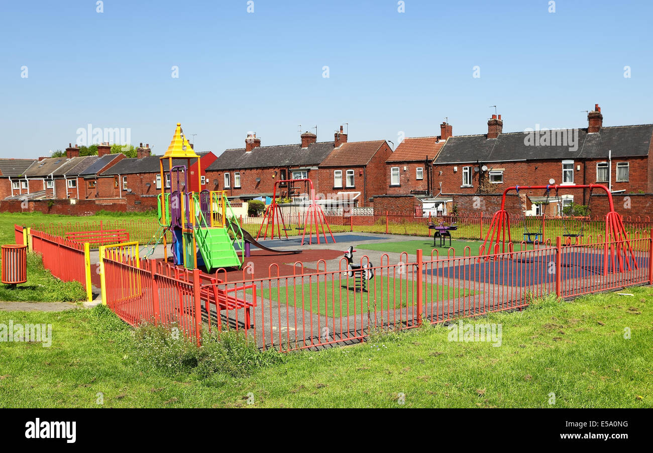 Playground and typical English buildings Stock Photo - Alamy