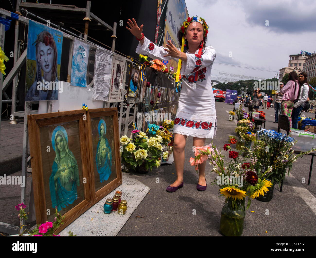 Woman in national dress reads poetry scene near the Maidan. 23rd July ...