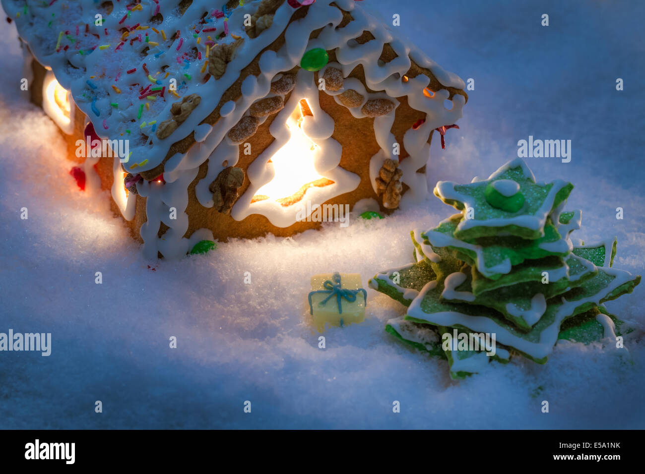 Gingerbread house under tree christmas hi-res stock photography and ...