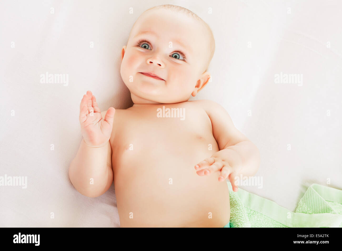 cute child on white fabric Stock Photo - Alamy