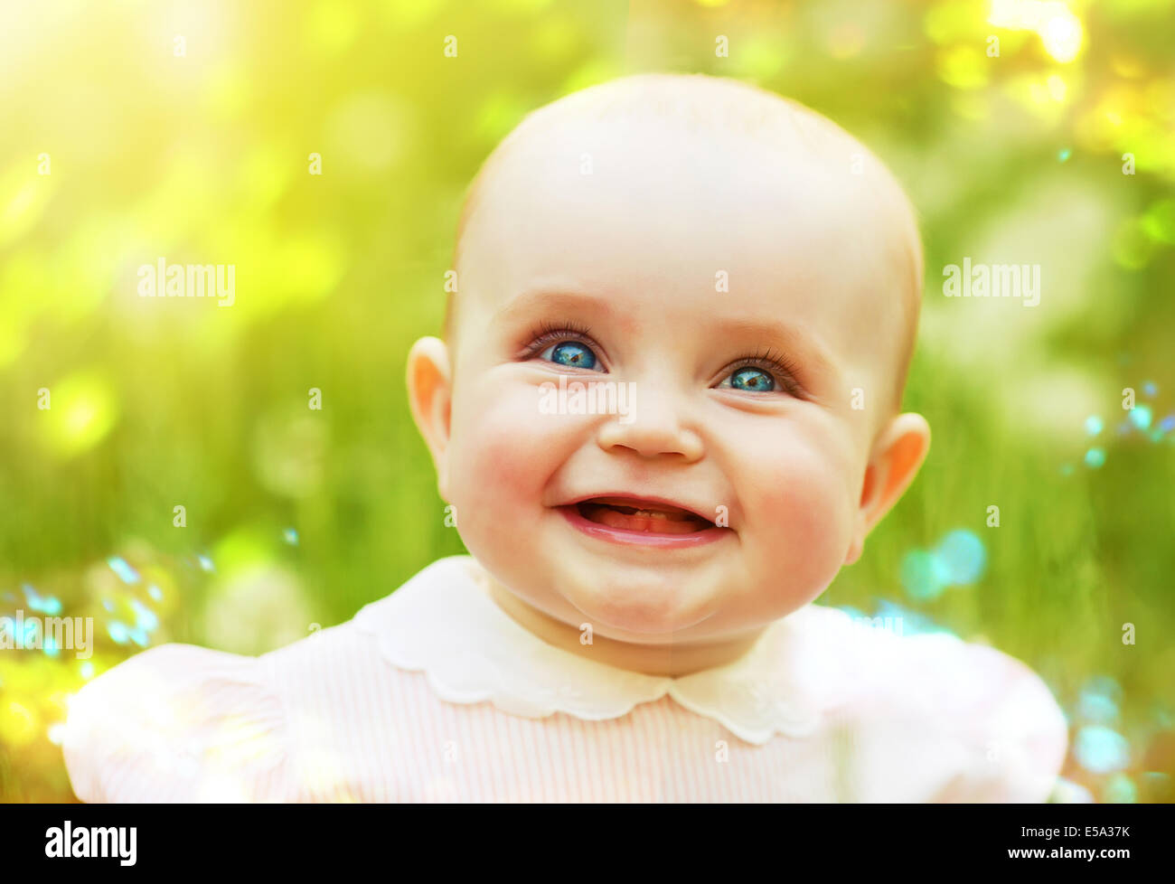 smiling child on the field Stock Photo - Alamy