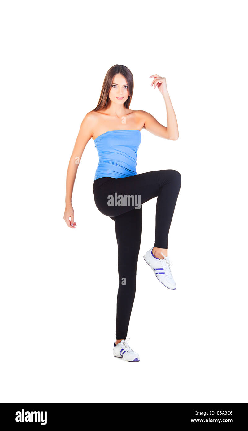 woman doing her gym exercise with one leg up on white background Stock ...