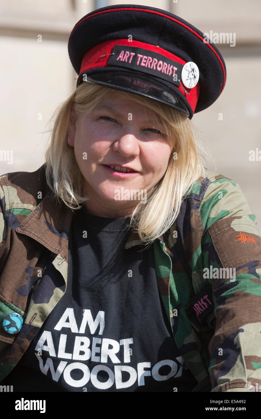 Ceramic artist Carrie Reichardt poses with her new mosaic installations ...
