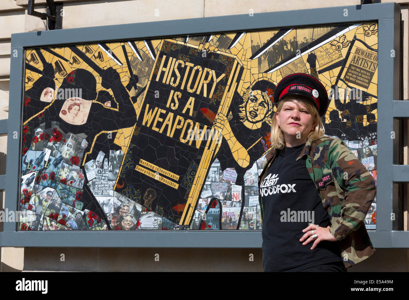 Ceramic artist Carrie Reichardt poses with her new mosaic installations ...