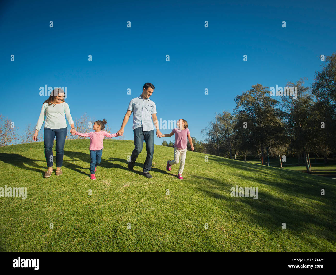 Walking park mother holding hi-res stock photography and images - Alamy