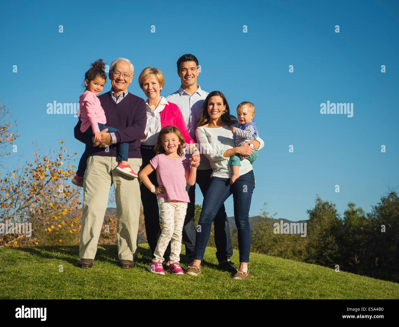 Grandfather father grandson standing together hi-res stock photography ...