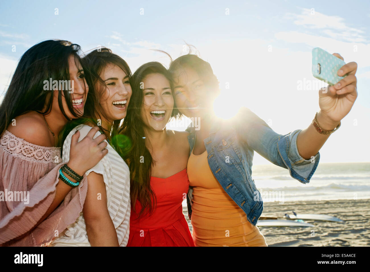Women on beach back hi-res stock photography and images - Alamy