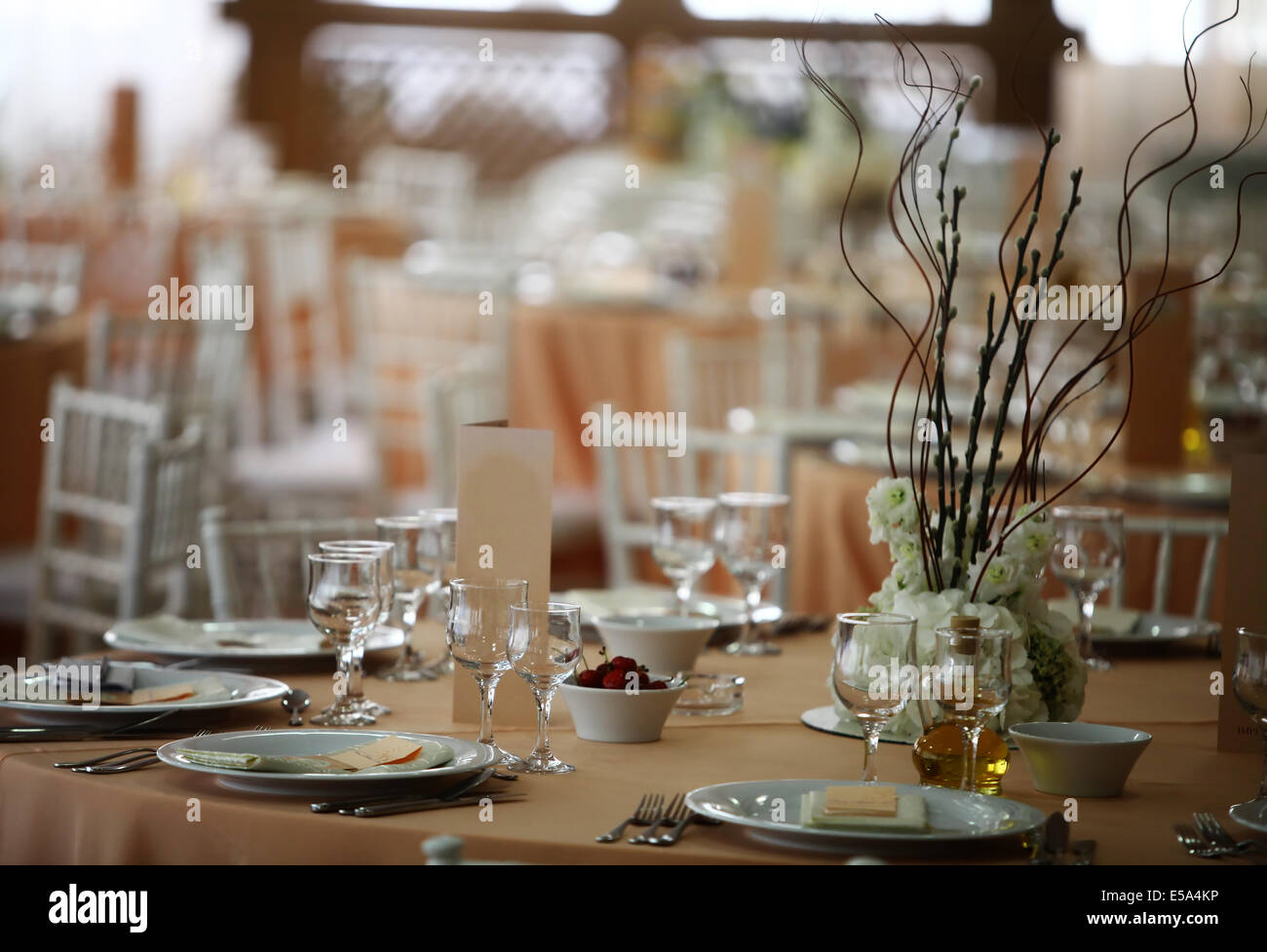 Shot with a dinner table in a restaurant Stock Photo - Alamy