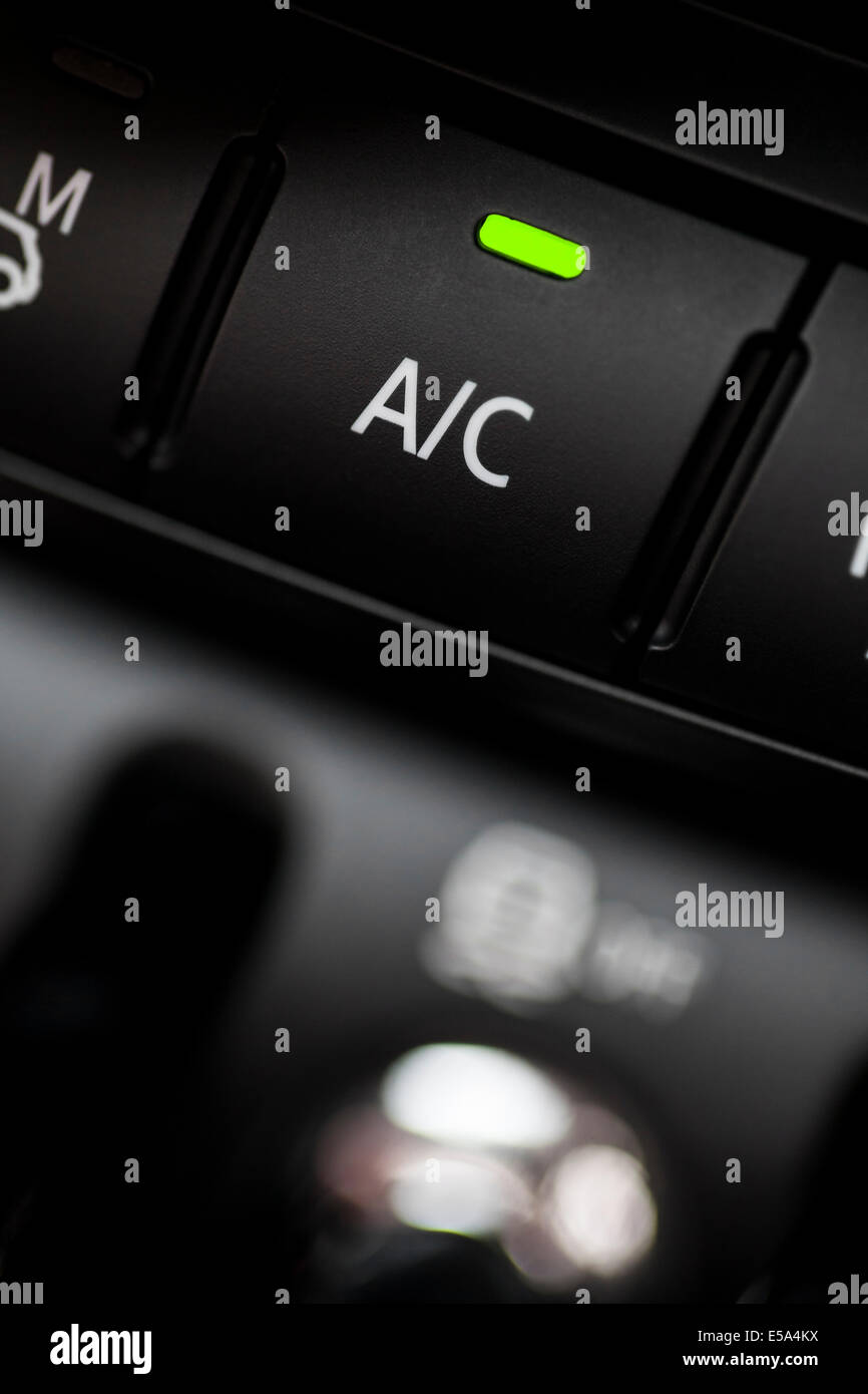 Color detail with the air conditioning button inside a car Stock Photo ...