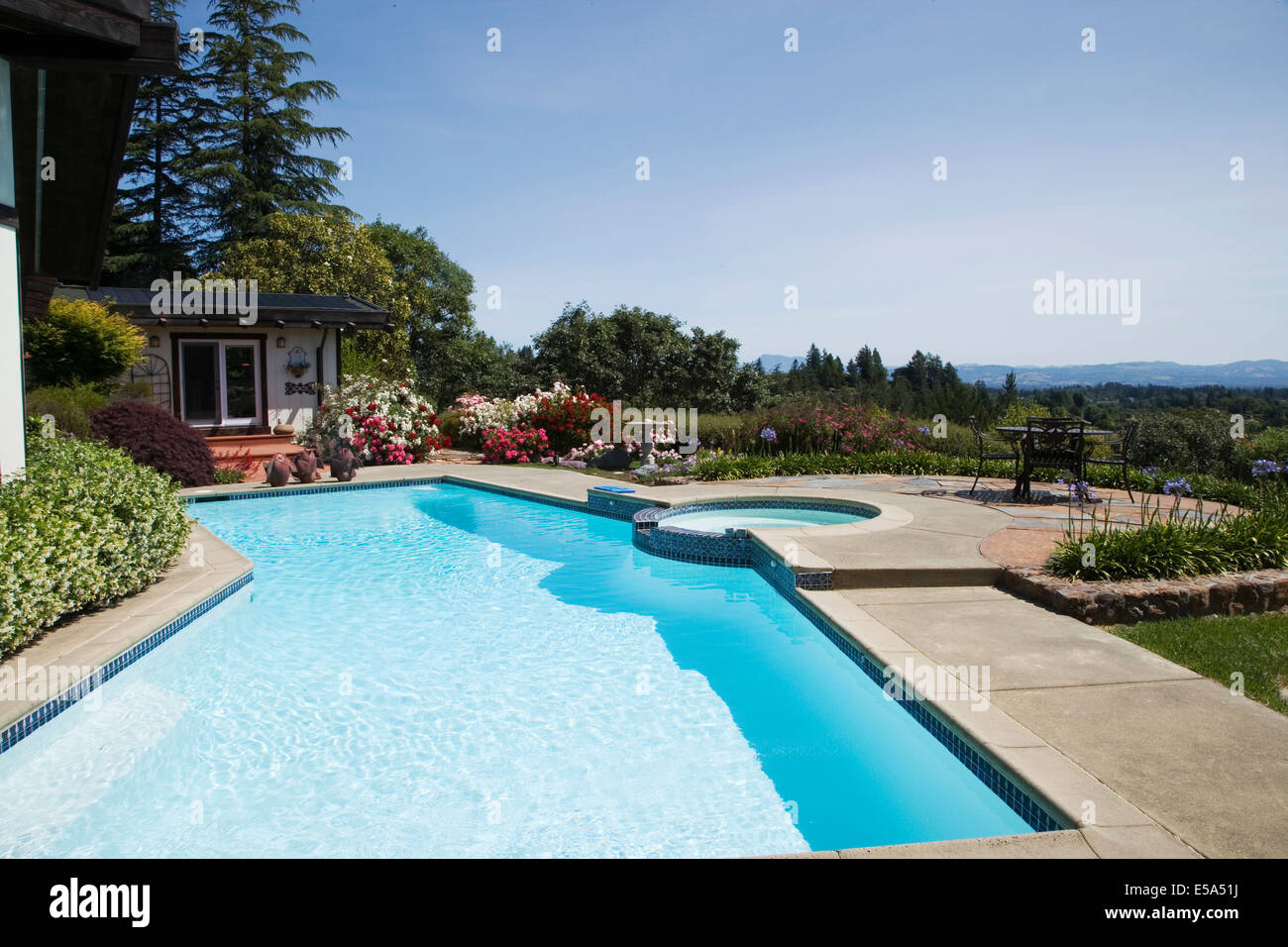 Swimming pool overlooking rural landscape Stock Photo - Alamy