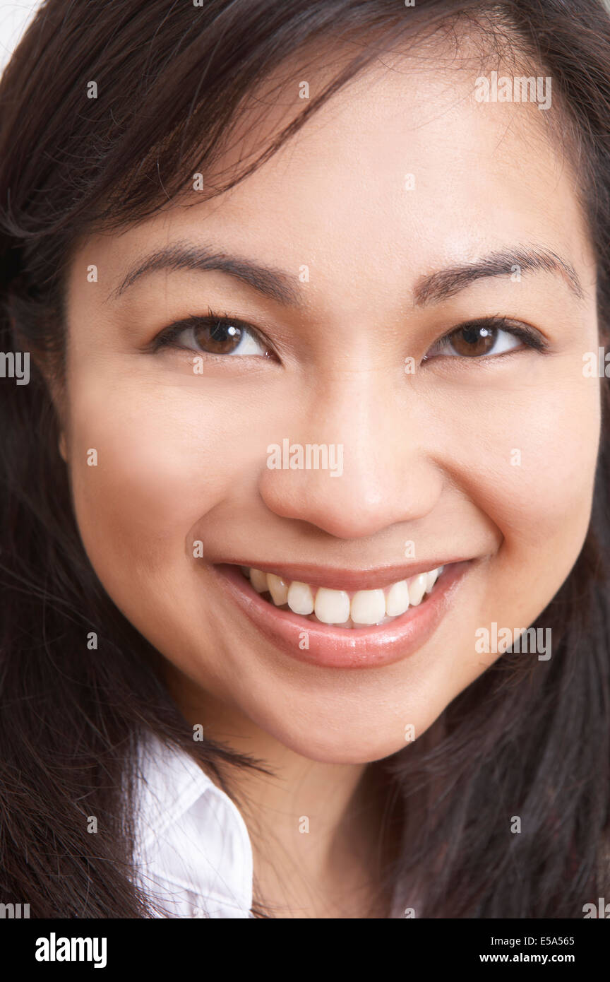 Filipino woman smiling Stock Photo - Alamy
