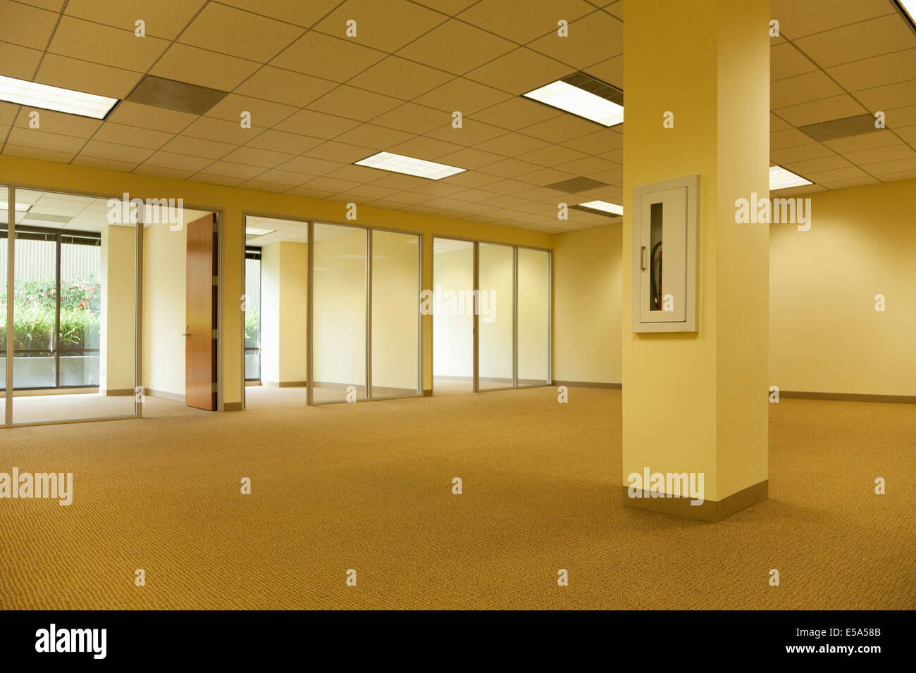 Empty rooms in office building Stock Photo - Alamy