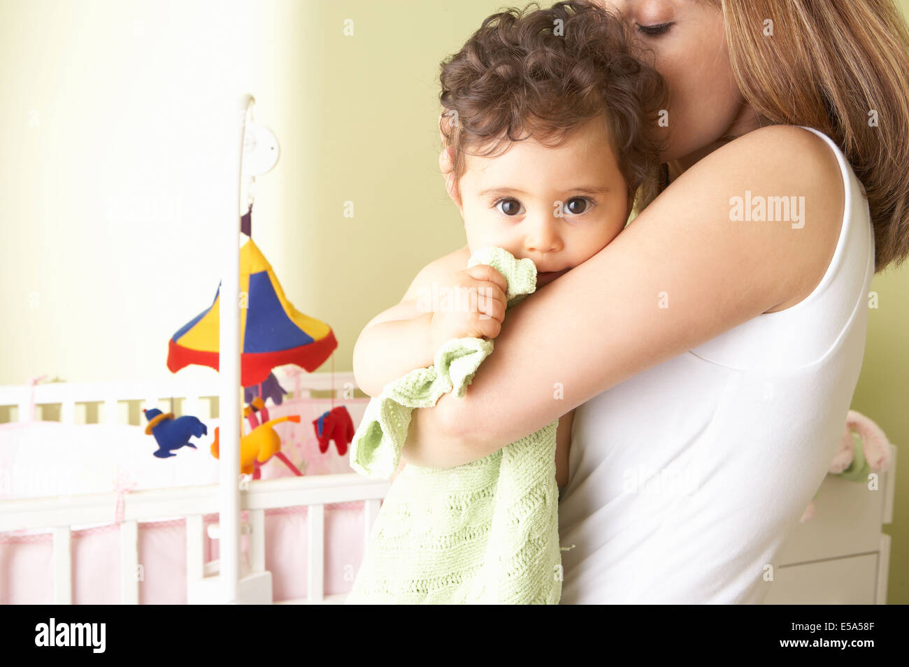 Woman cradling baby blanket hi-res stock photography and images - Alamy
