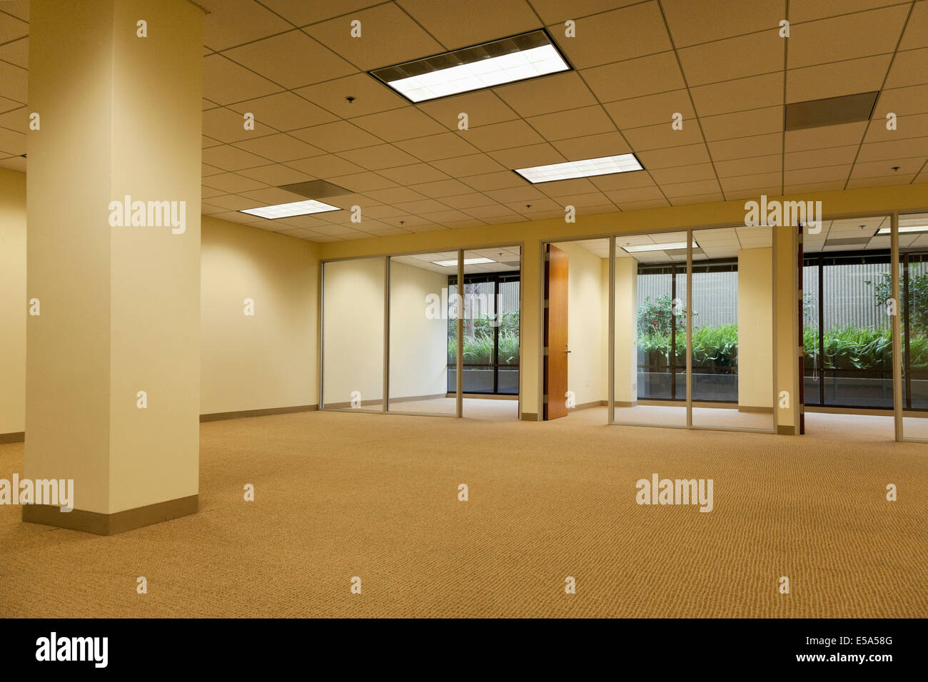 Empty rooms in office building Stock Photo - Alamy