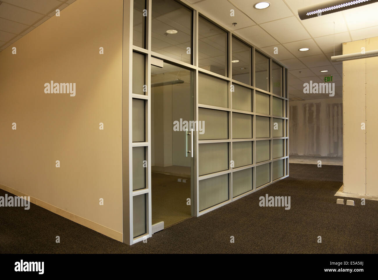 Empty rooms in office building Stock Photo - Alamy