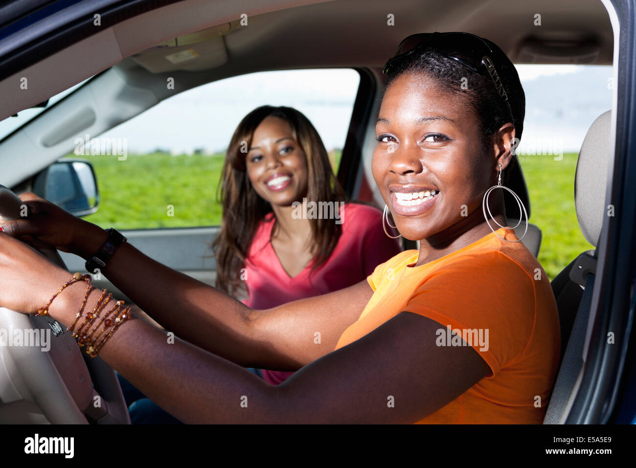 African American women driving together Stock Photo - Alamy