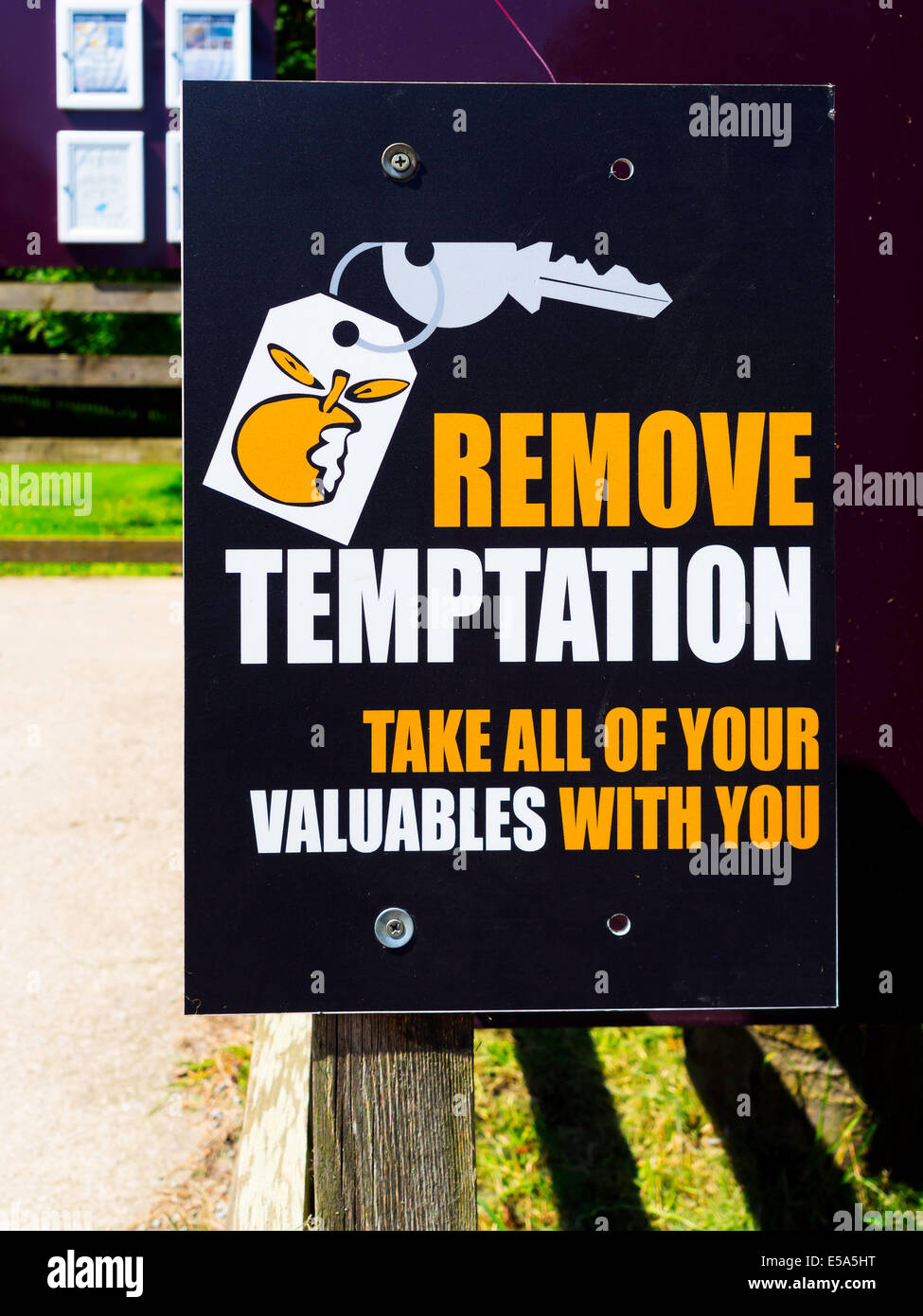 Warning sign Remove Temptation: take all your valuables with you Stock ...