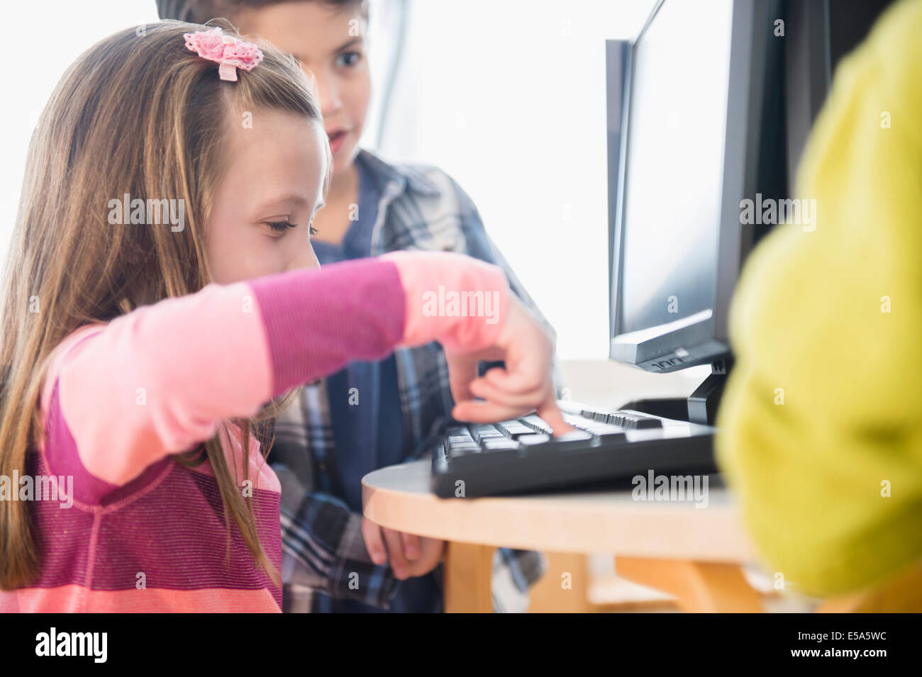 Children using computers in classroom Stock Photo - Alamy