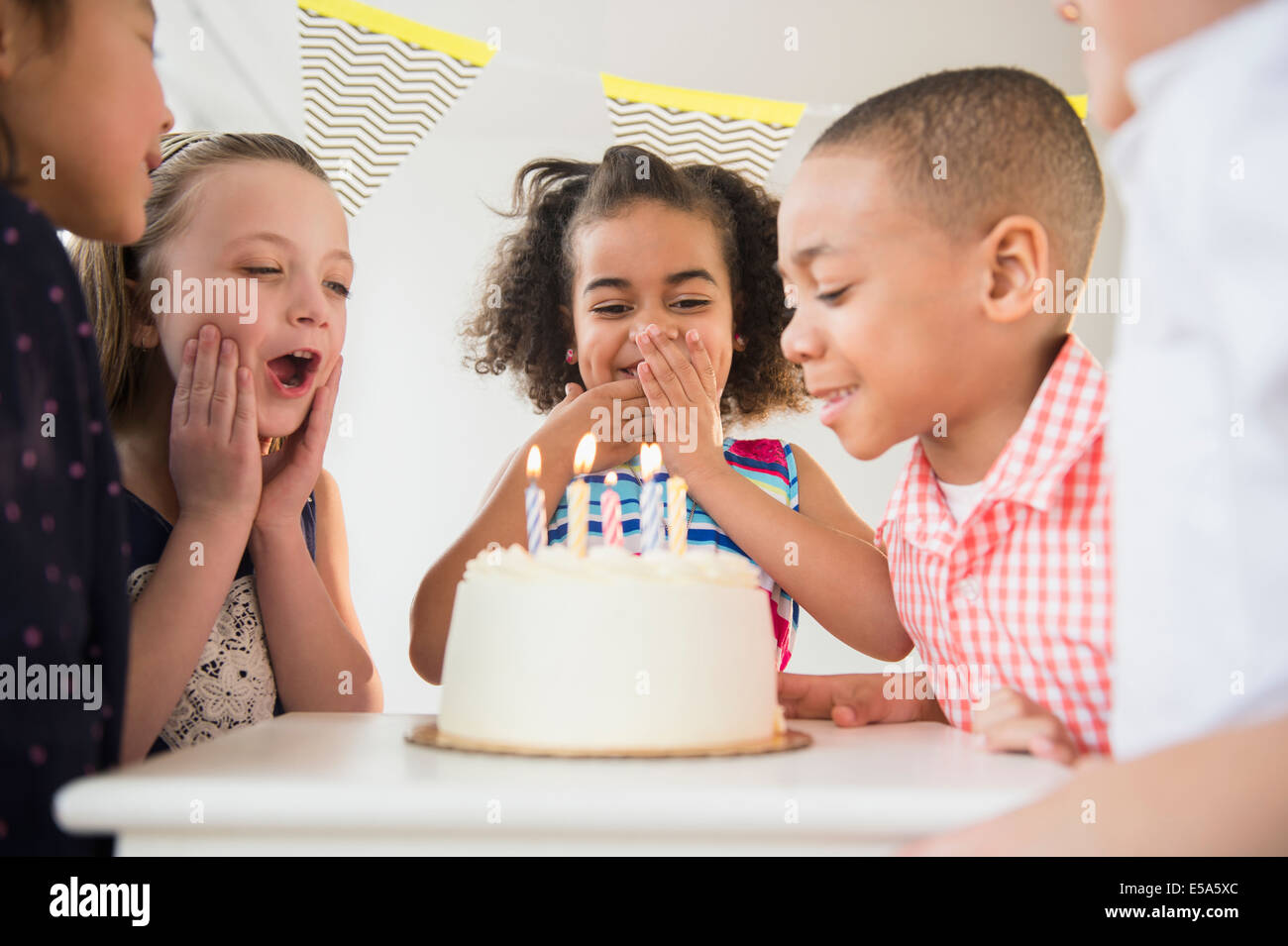 Children celebrating birthday together Stock Photo - Alamy