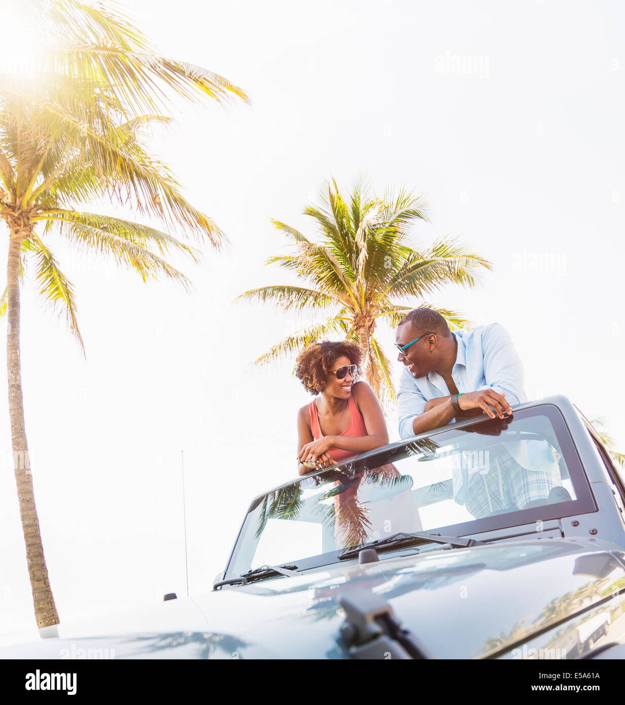 Couple relaxing together in car Stock Photo - Alamy