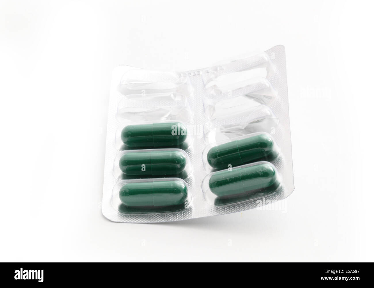 green tablets in a package Stock Photo - Alamy