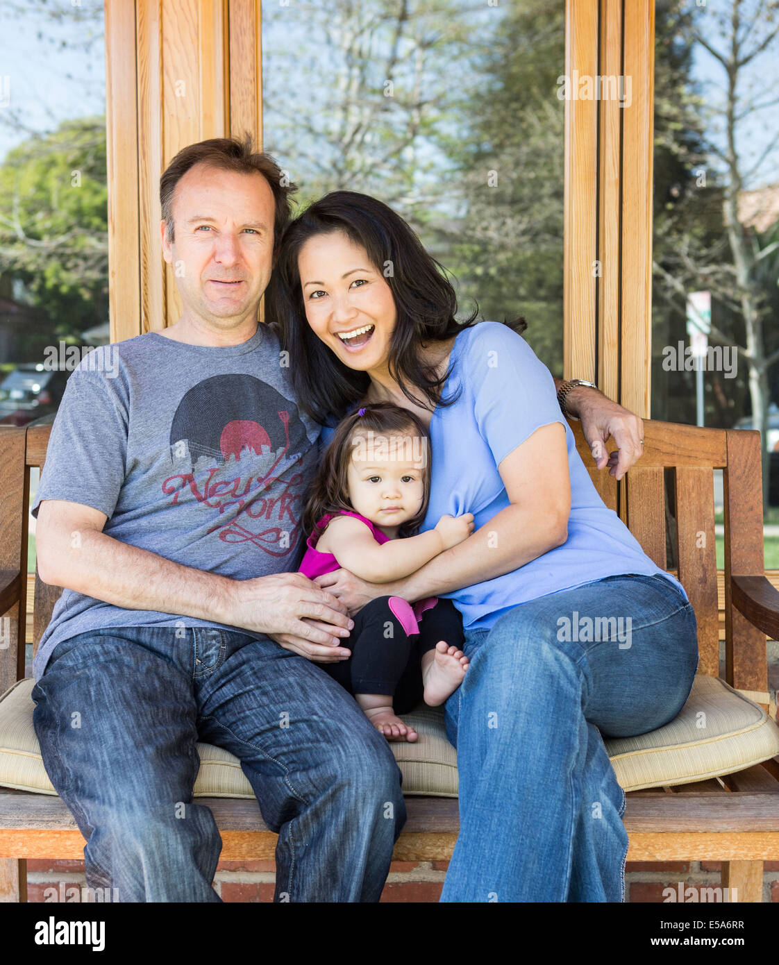 Extended Family Relaxing At Home Together Stock Image