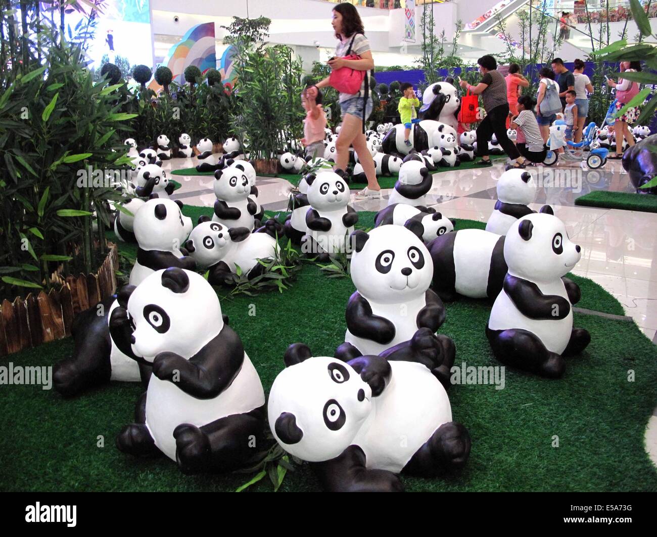 Bamboo pandas are placed on the lawn prior to an exhibition called '1st ...