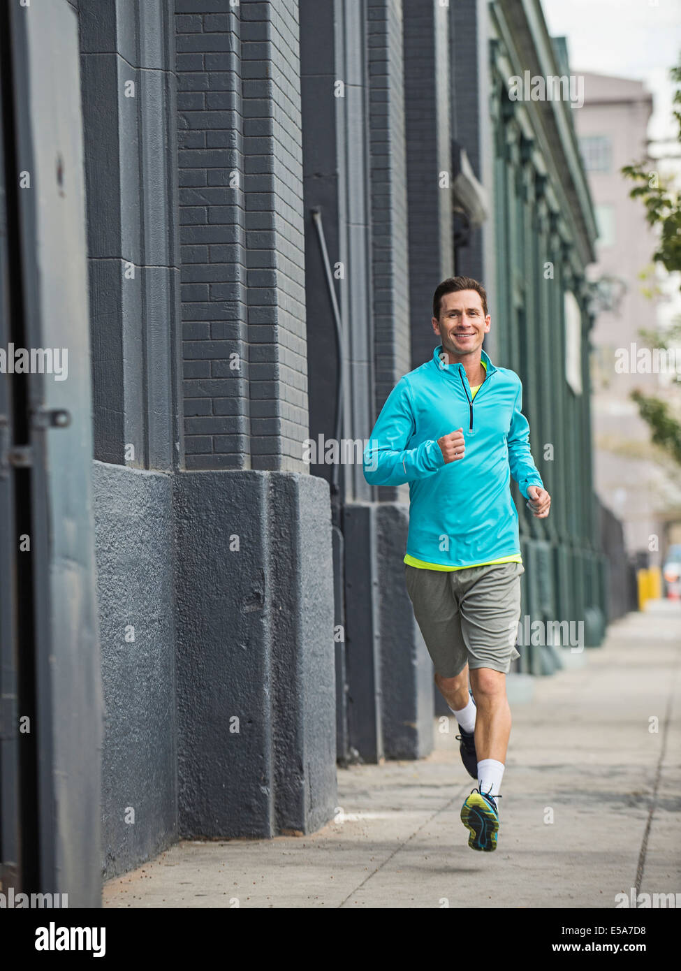 Man running camera not woman not beach hi-res stock photography and ...
