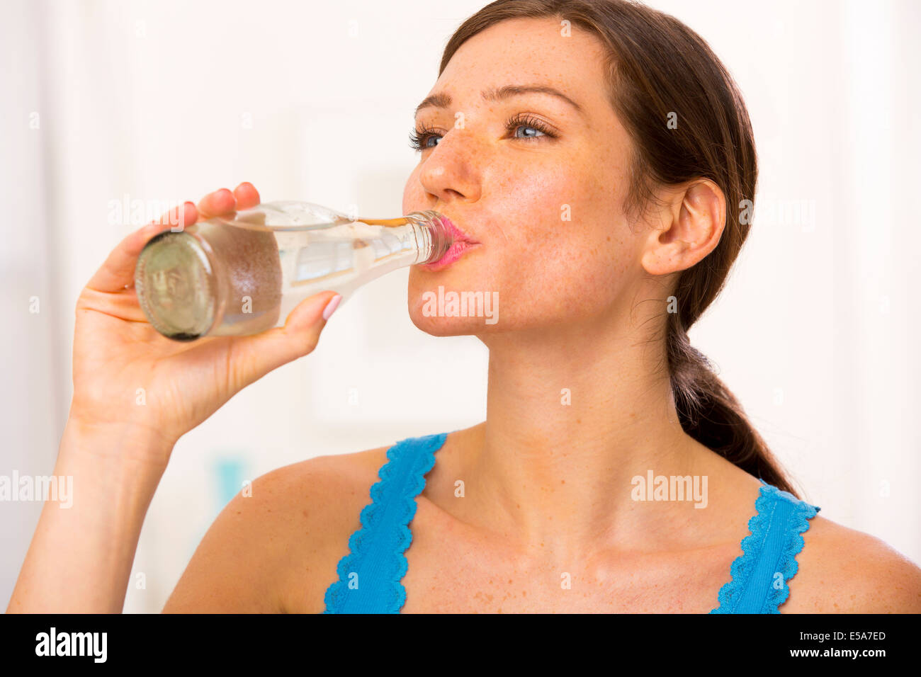Woman drinking water hi-res stock photography and images - Alamy