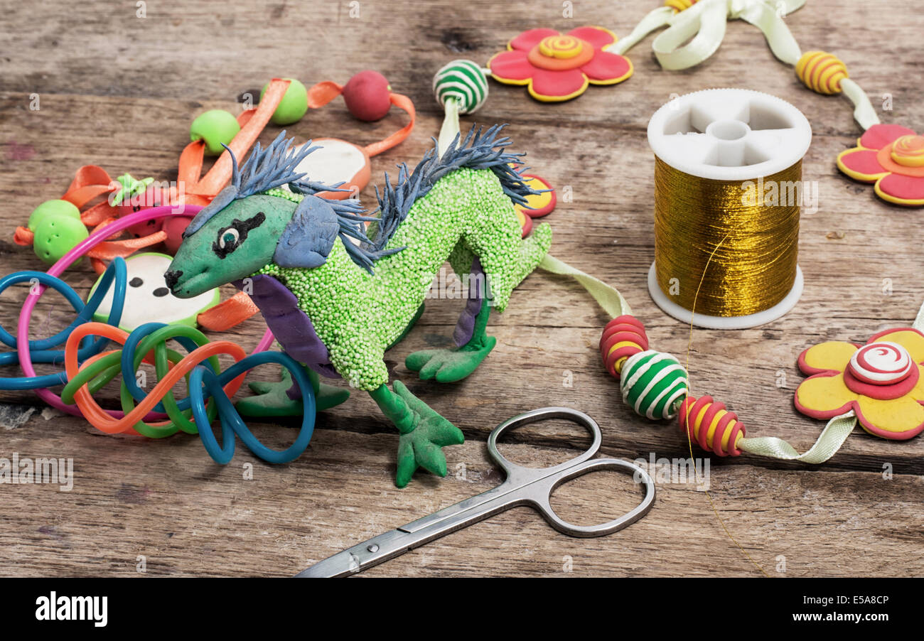 creative modeling child of colored clay Stock Photo - Alamy
