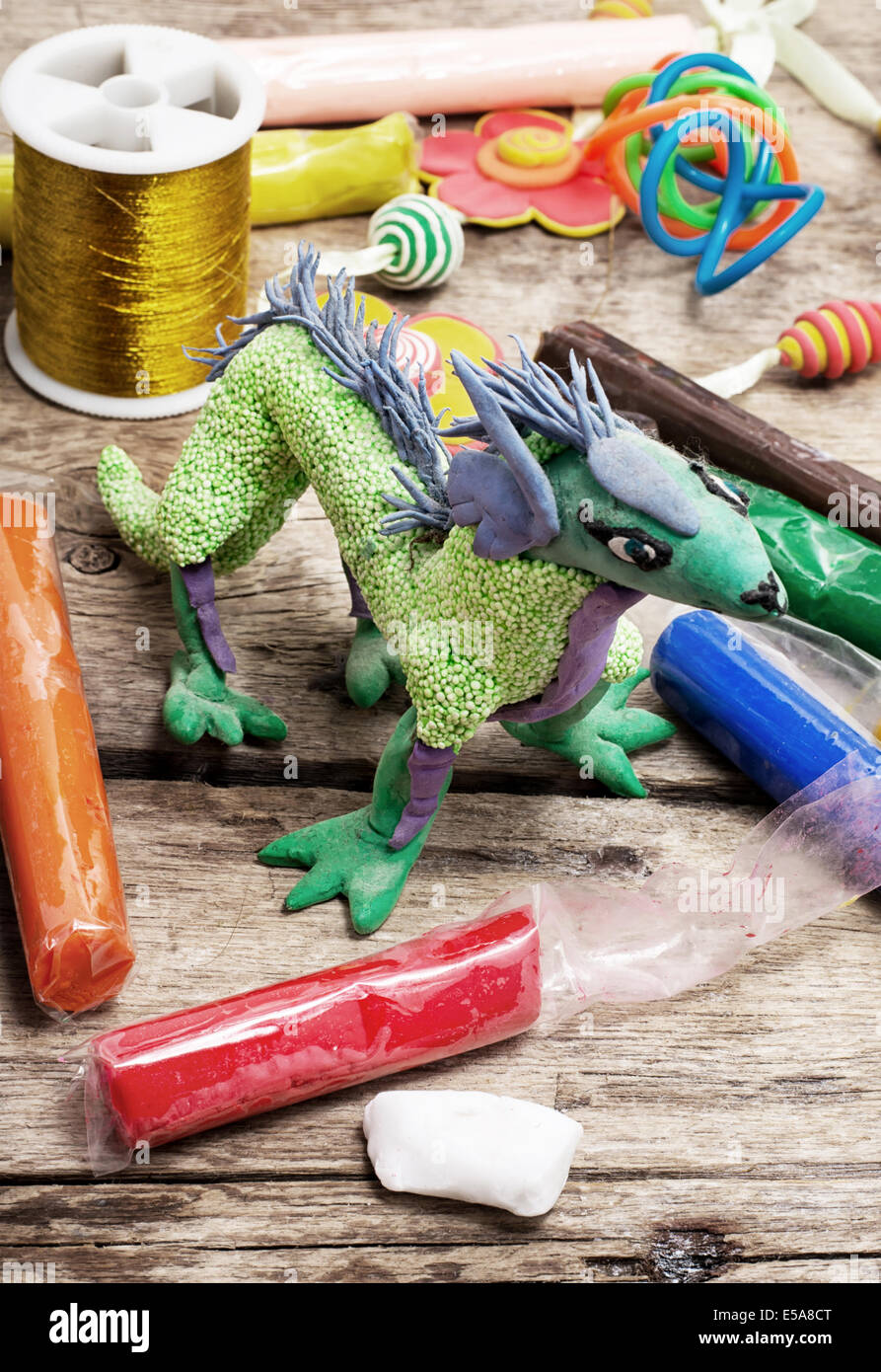 creative modeling child of colored clay Stock Photo - Alamy