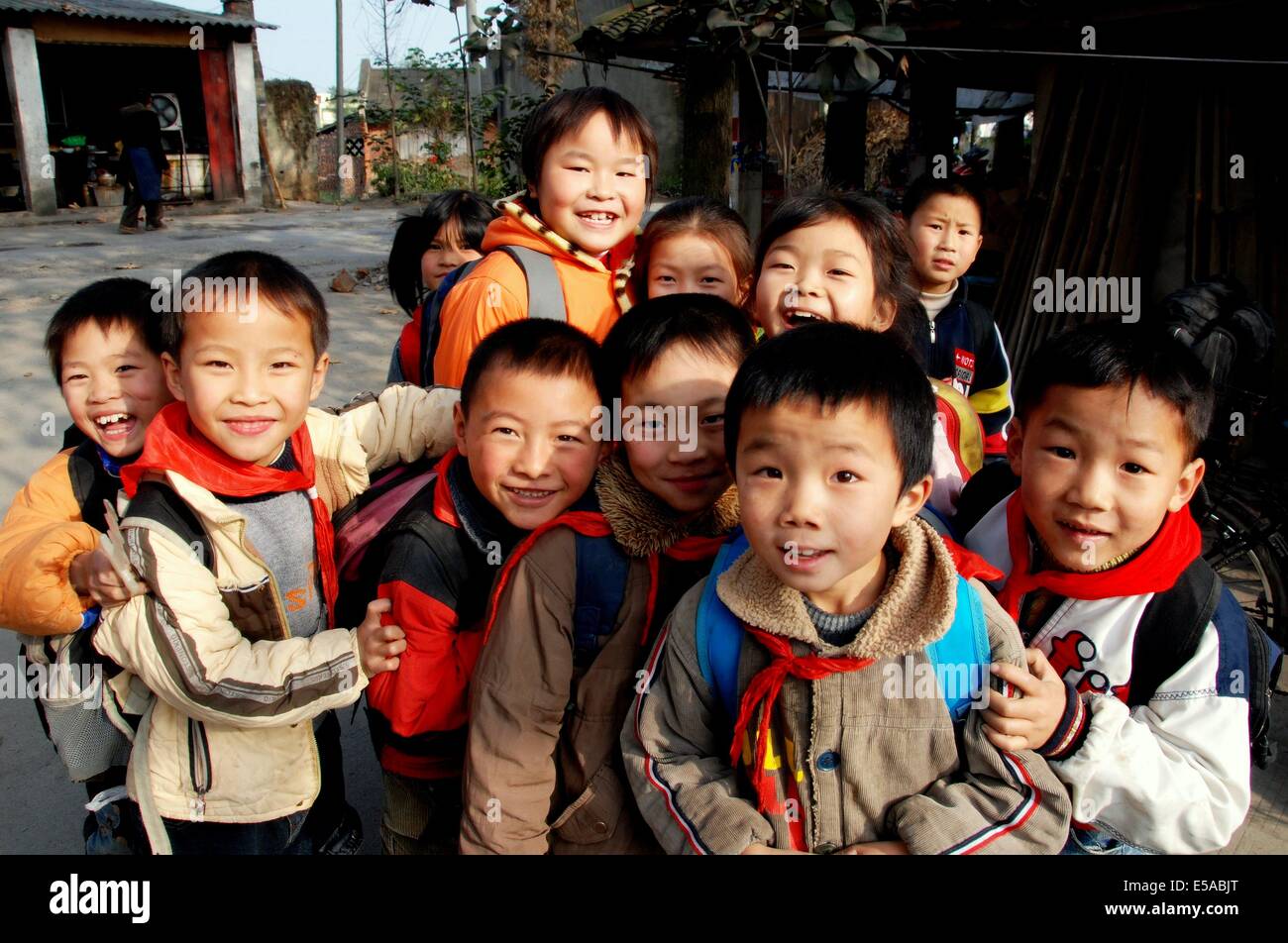 Li 'an, China: Group of happy school children on a country road near ...
