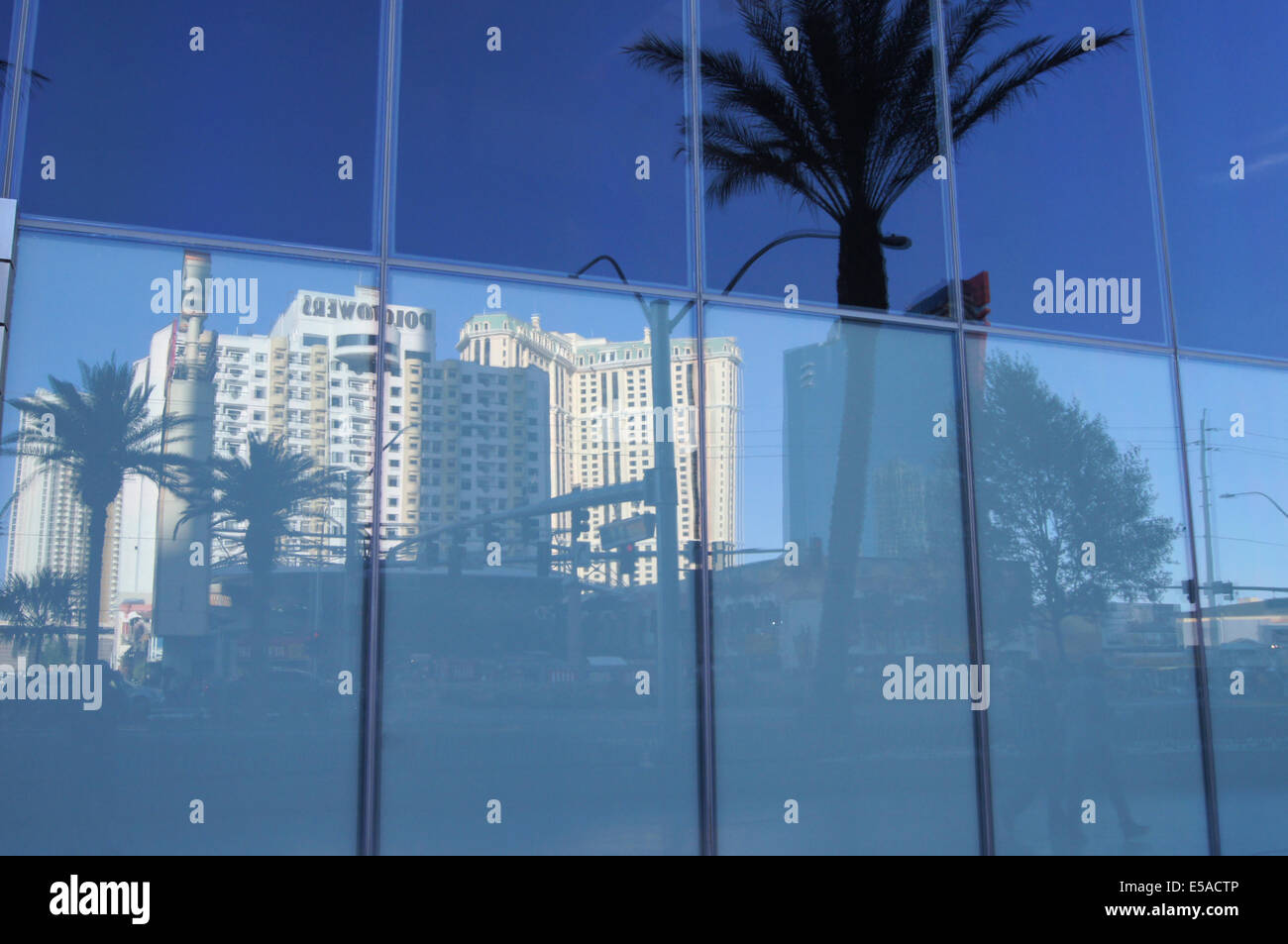 Reflection of a hotel in a shop window Stock Photo - Alamy