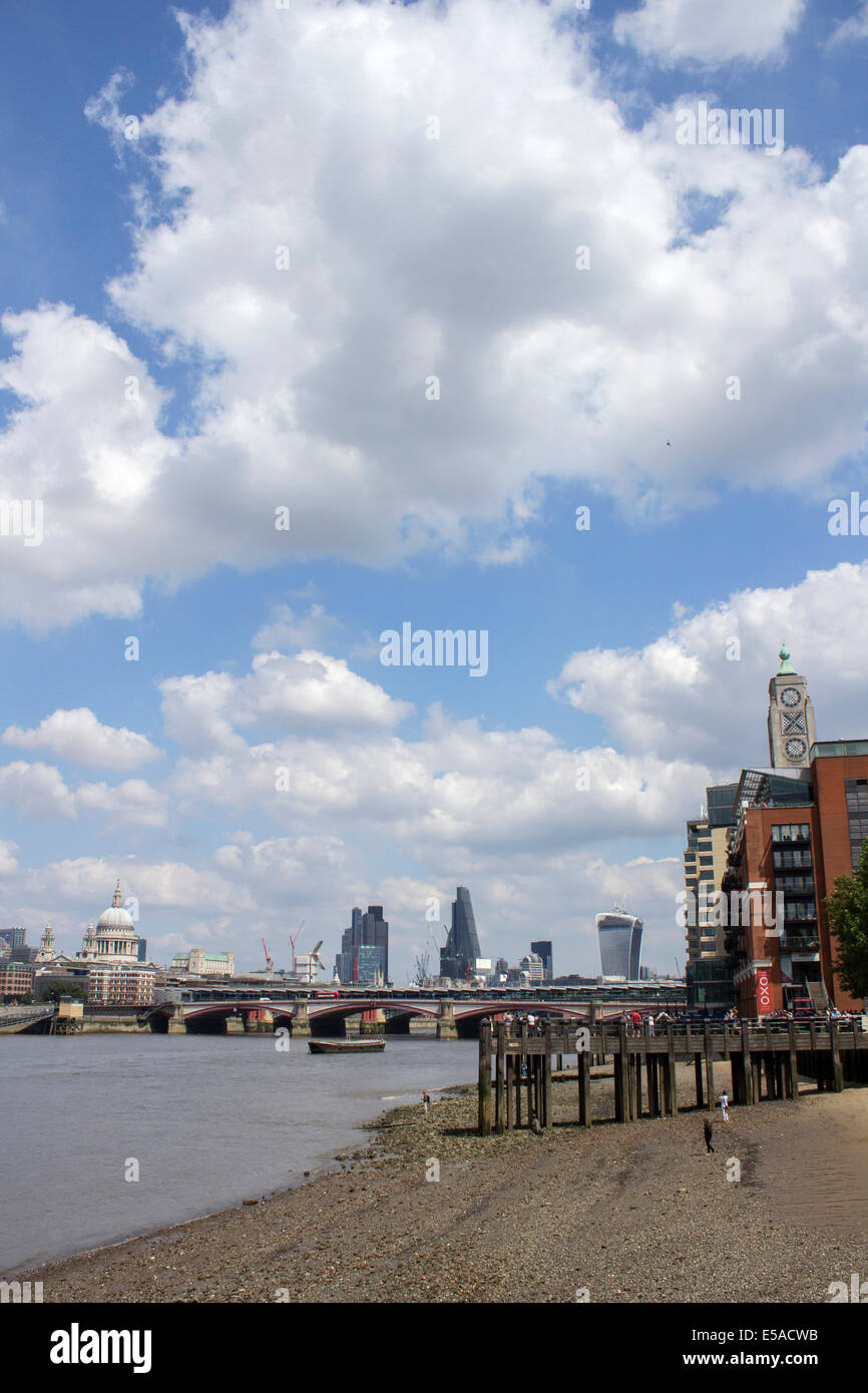 LONDON - JUNE 21. Low tide at the Oxo Tower Wharf building with St ...