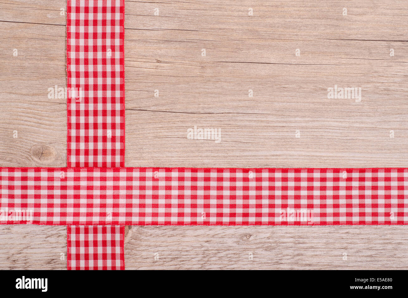 Red and white checkered ribbons on old wood Stock Photo - Alamy
