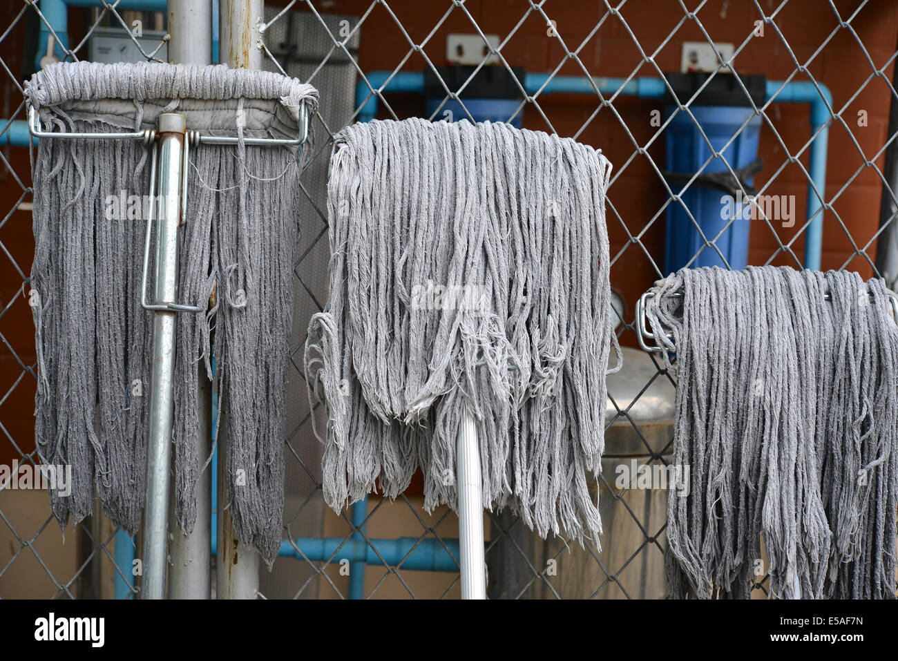 Old cleaning mops hi-res stock photography and images - Alamy