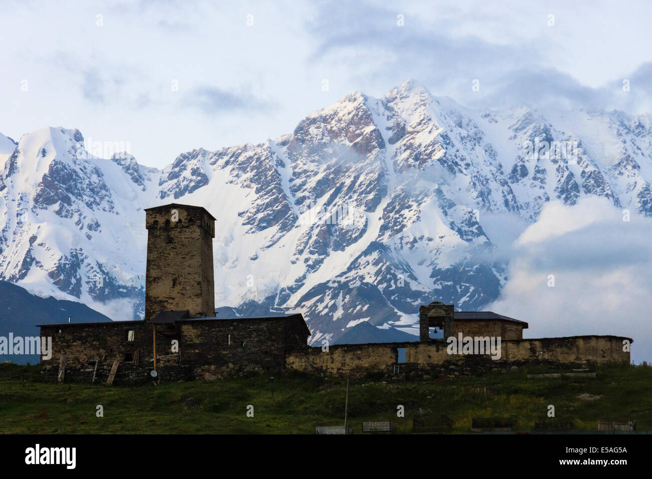 Shkhara peak, tower and Lamaria church. Ushguli, Svaneti, Georgia Stock ...