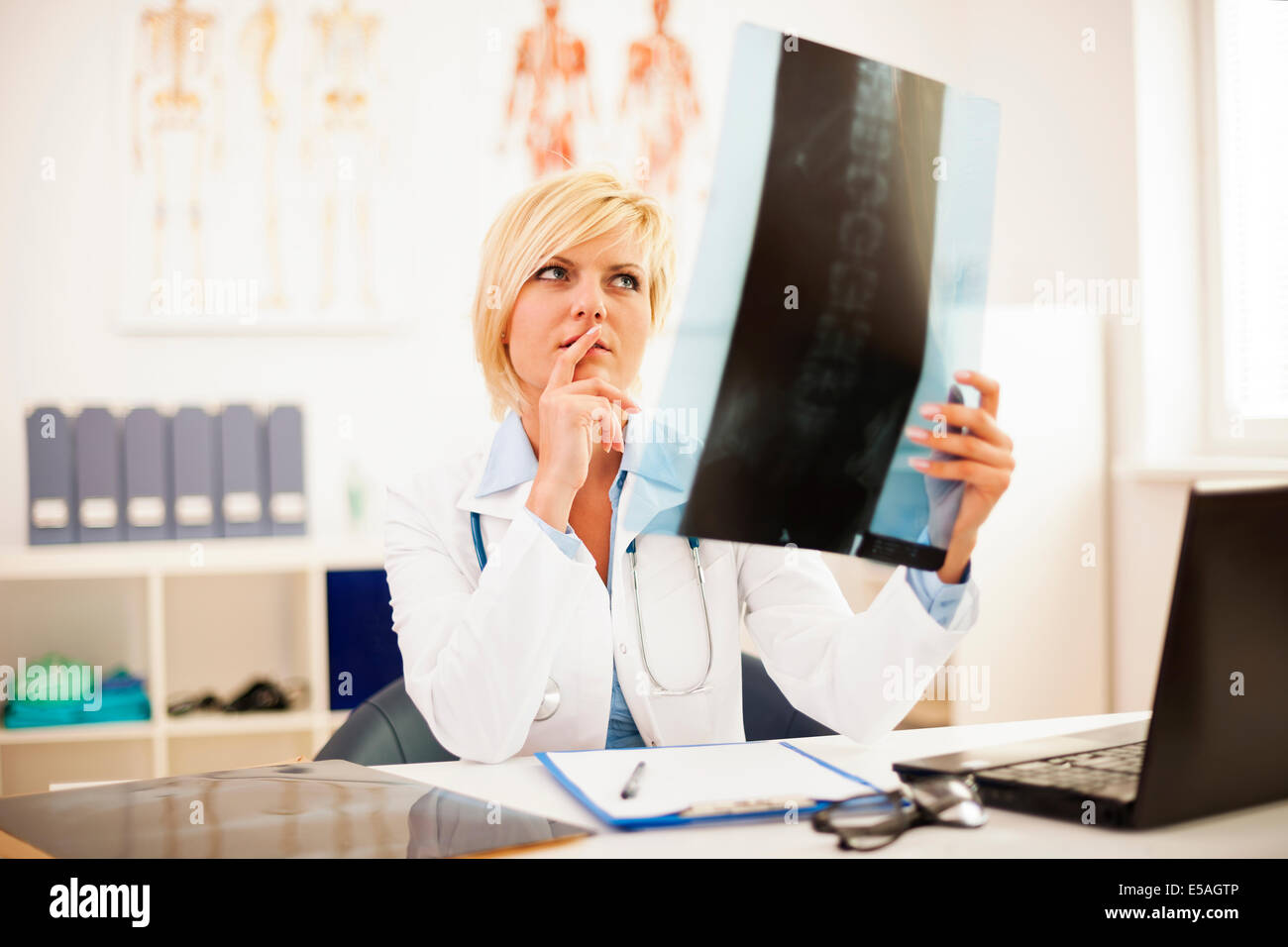 Female doctor studying spine x-ray, Debica, Poland Stock Photo - Alamy