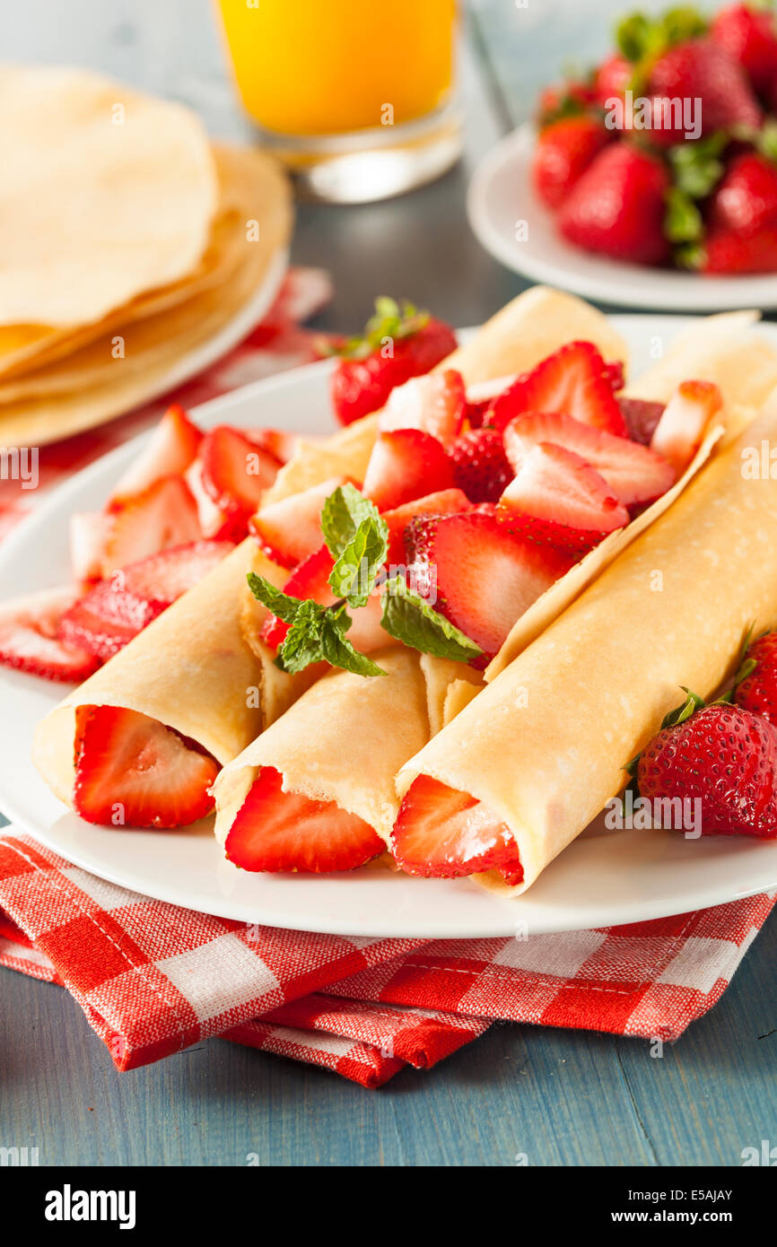 Fresh Strawberry French Crepes with Mint for Breakfast Stock Photo - Alamy
