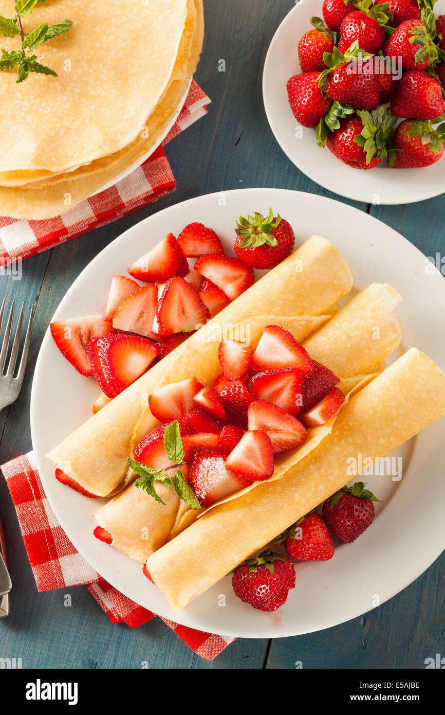 Fresh Strawberry French Crepes with Mint for Breakfast Stock Photo - Alamy