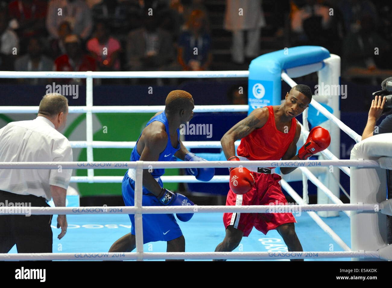 Merven Clair (MRI, red) and Rayton Okwiri (KEN, blue) boxing during the preliminary matches of ...