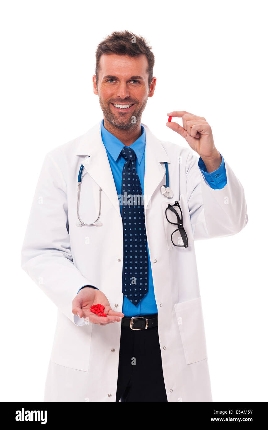 Smiling doctor offering medicines Debica, Poland Stock Photo - Alamy