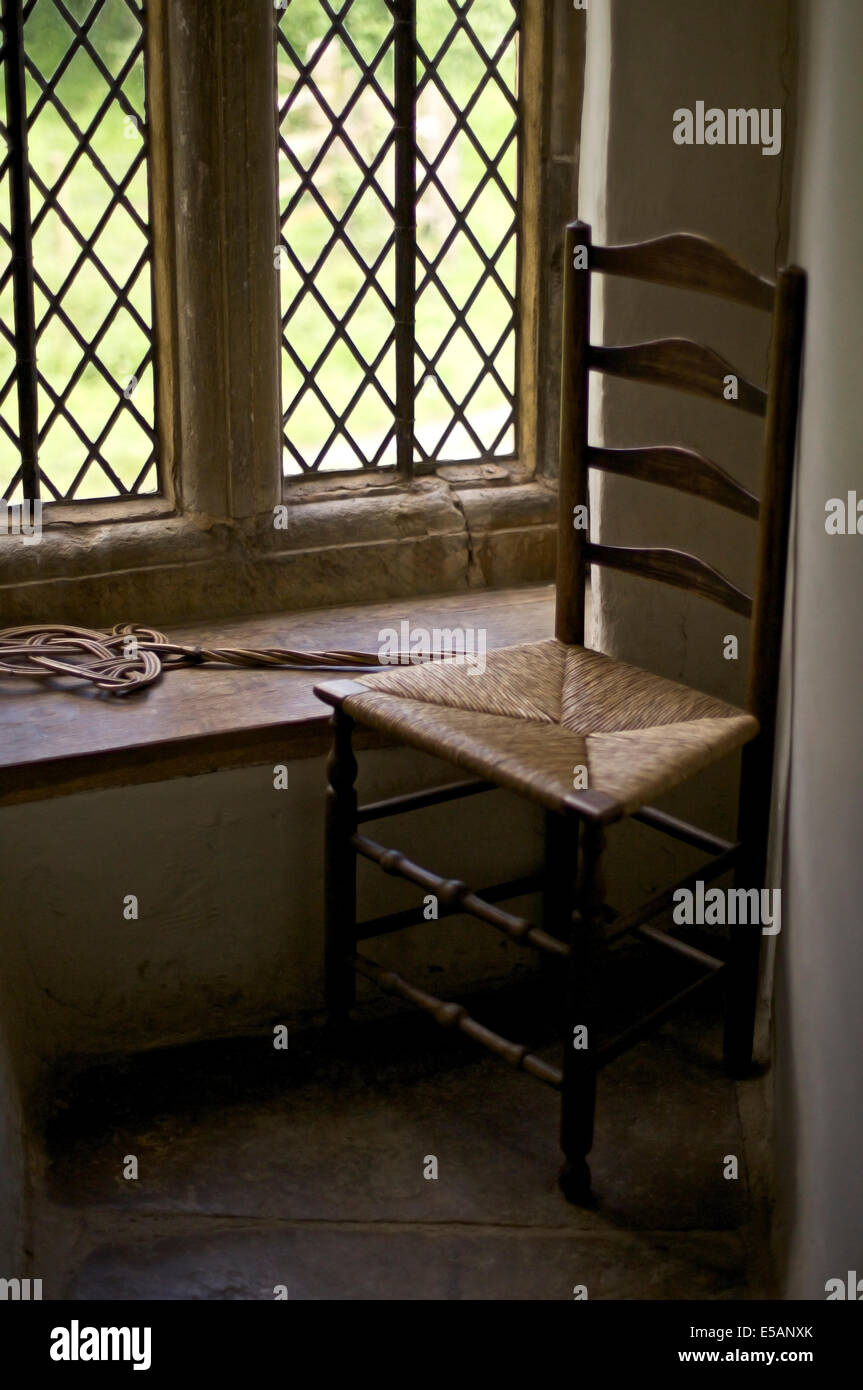 medieval chair in window light Stock Photo - Alamy