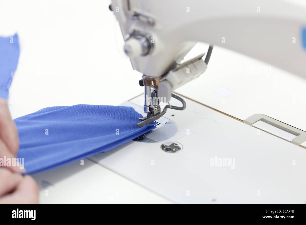 Blue sewing machine hi-res stock photography and images - Alamy