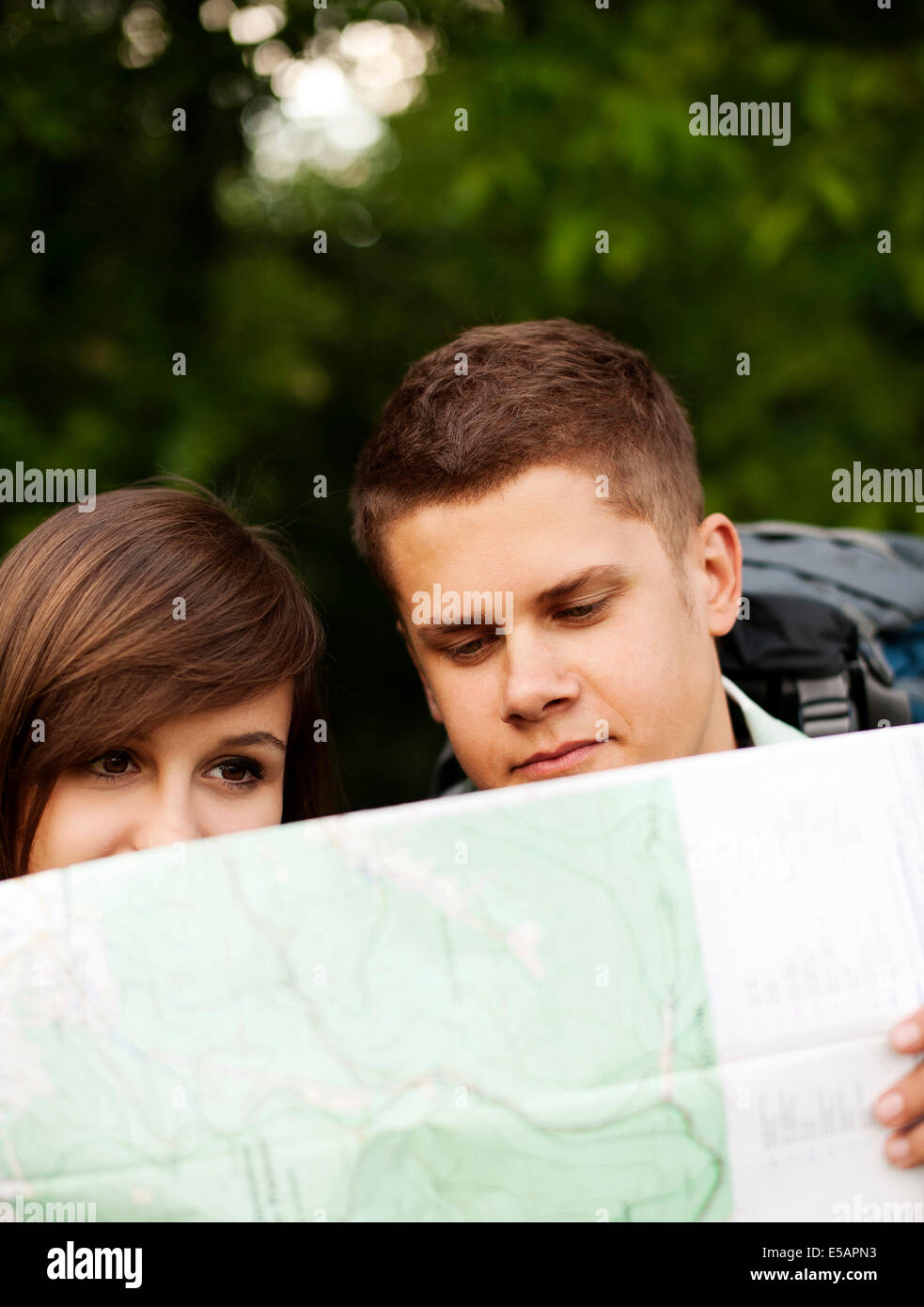 Couple looking at map debica hi-res stock photography and images - Alamy