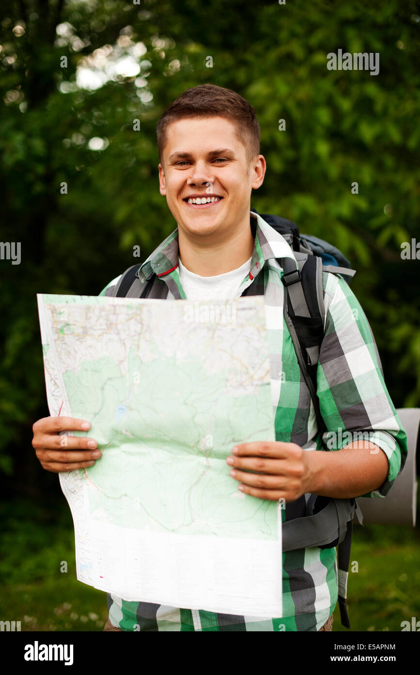 Man holding a map in forest Debica, Poland Stock Photo - Alamy