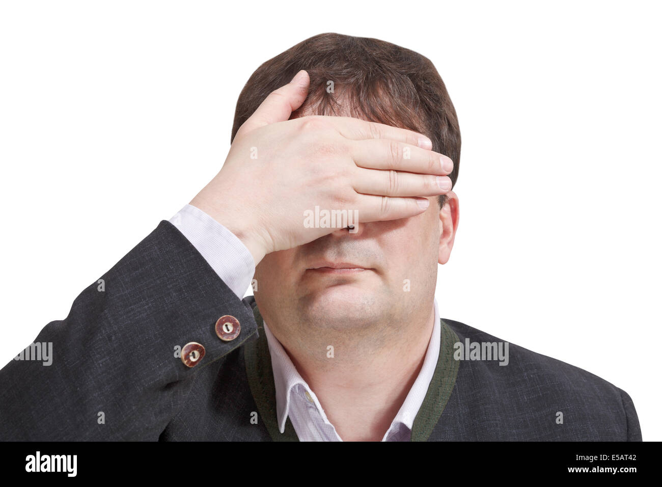 businessman closed his eyes by hand - hand gesture isolated on white ...