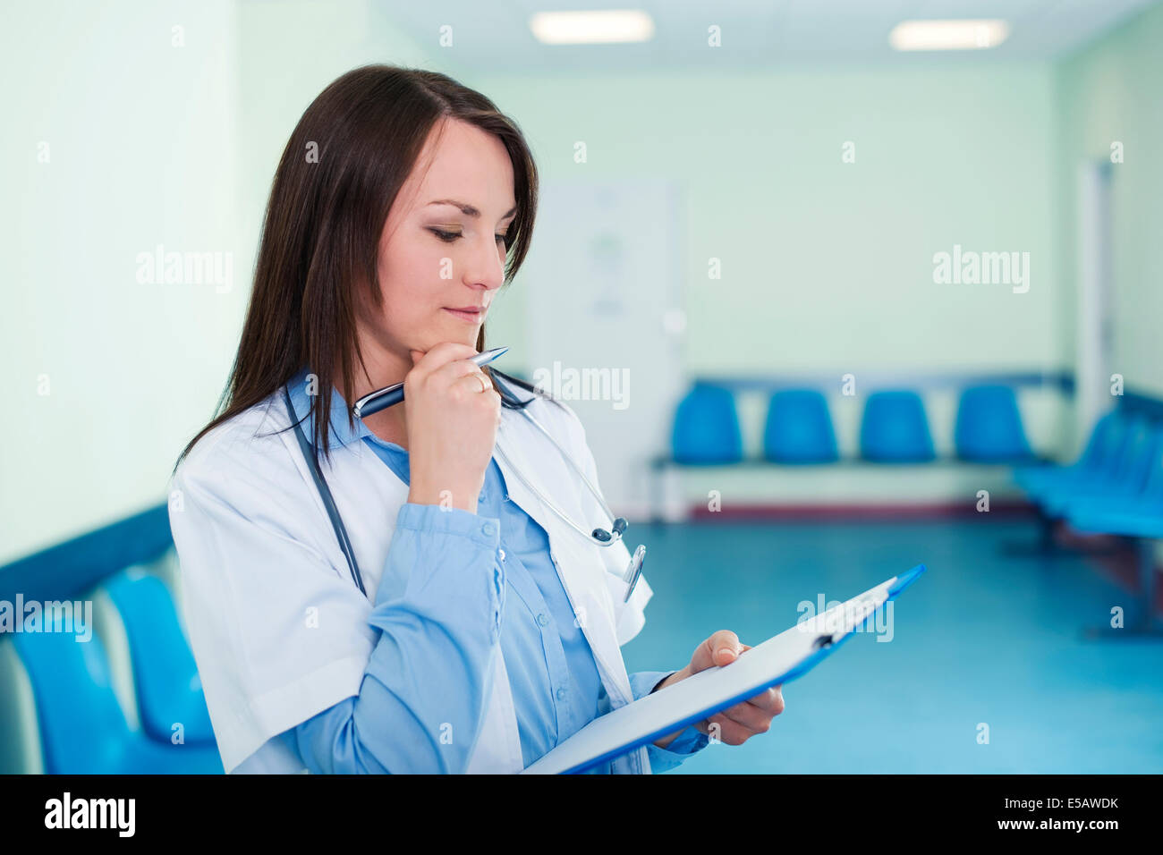 Female doctor checking medical results Debica, Poland Stock Photo - Alamy