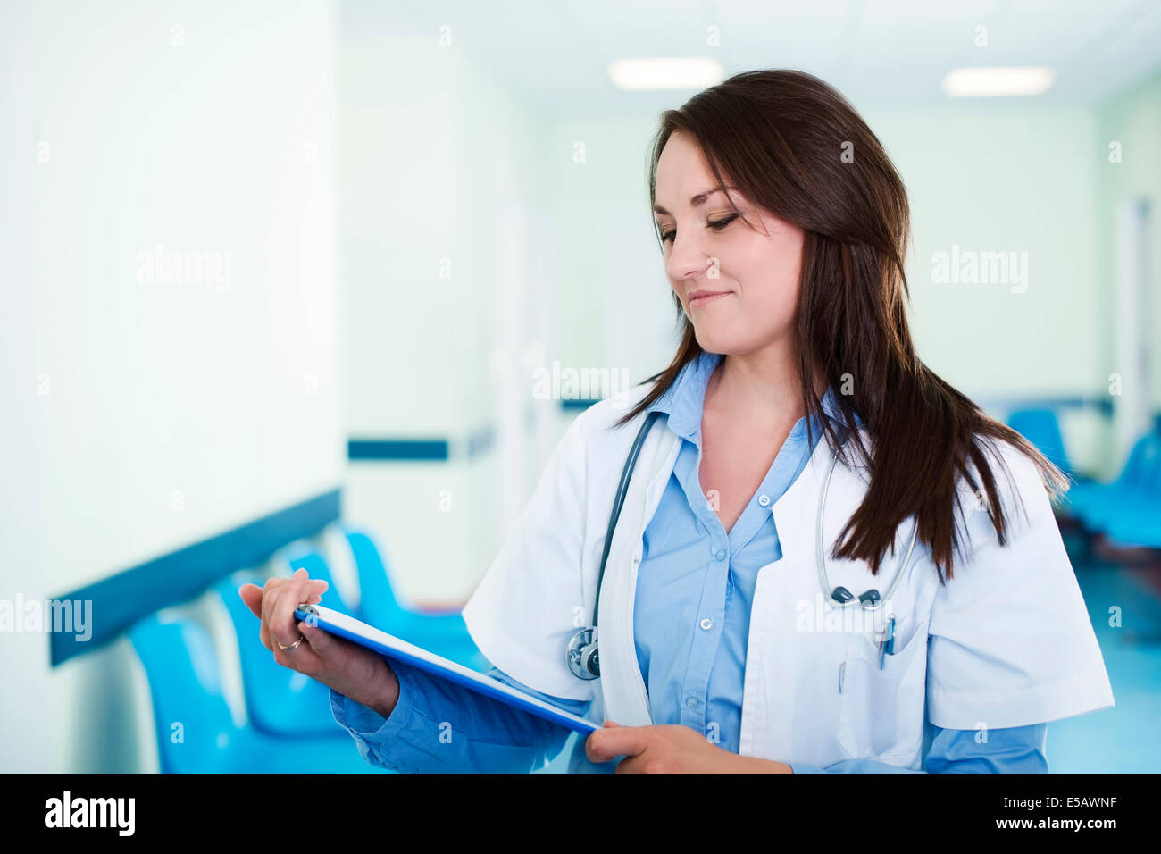 Female doctor checking medical results Debica, Poland Stock Photo - Alamy