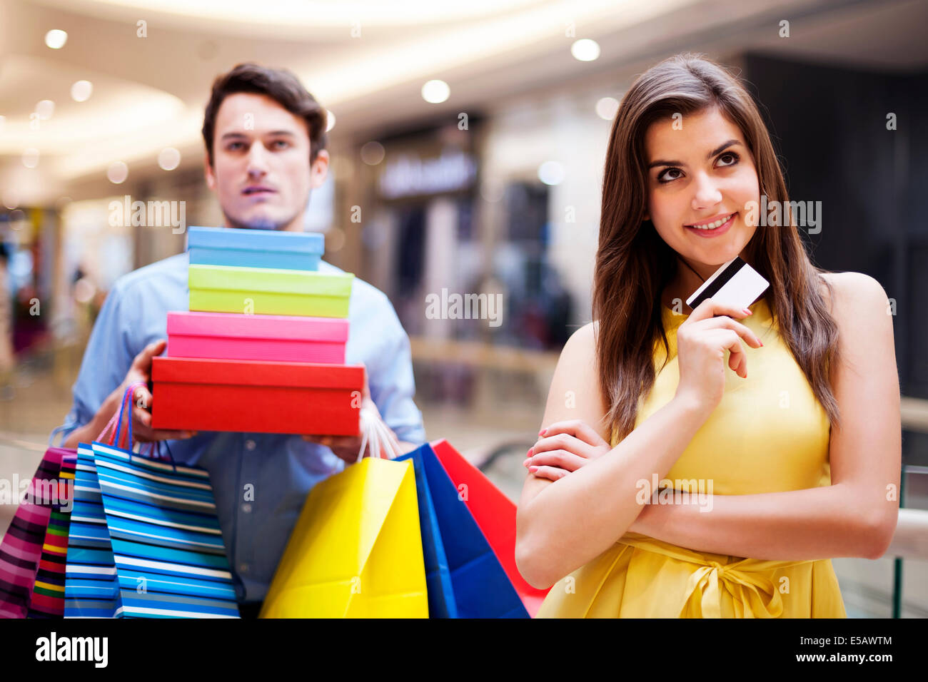 Shopaholic thinking hi-res stock photography and images - Alamy